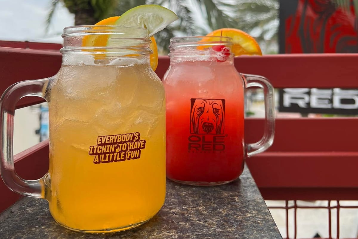 colorful drinks in take home souvenir mason jars