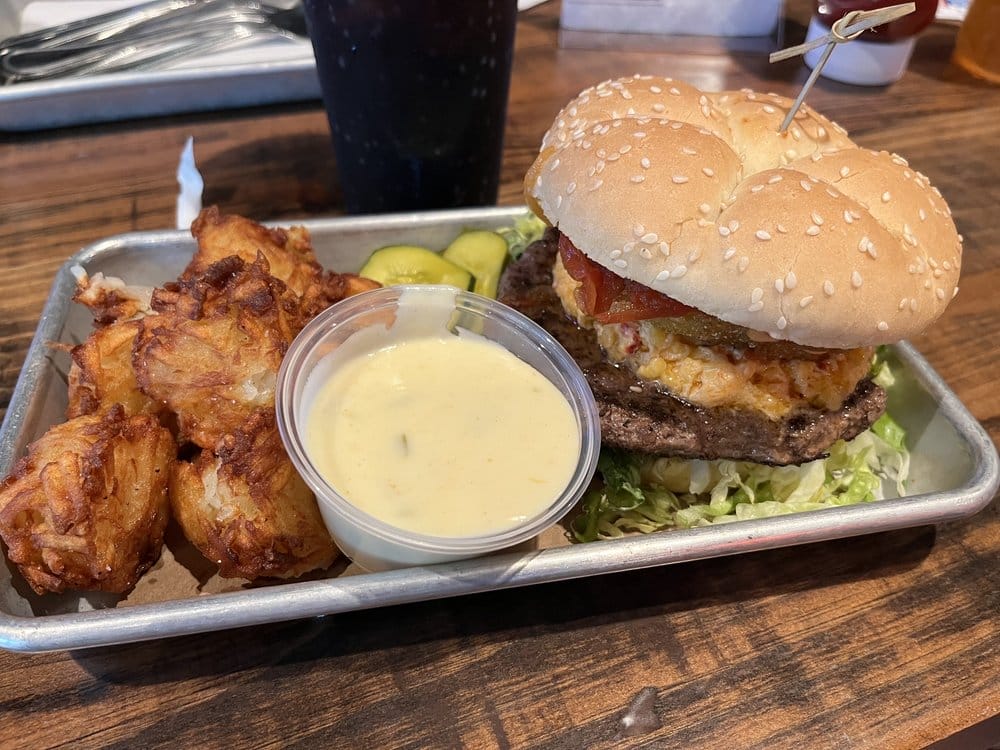 the southern gentleman with tater tots and queso dip