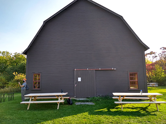 The historic barn at Goodsell Ridge Preserve stands as a humble gateway to an extraordinary 450-million-year journey through Earth's ancient past.