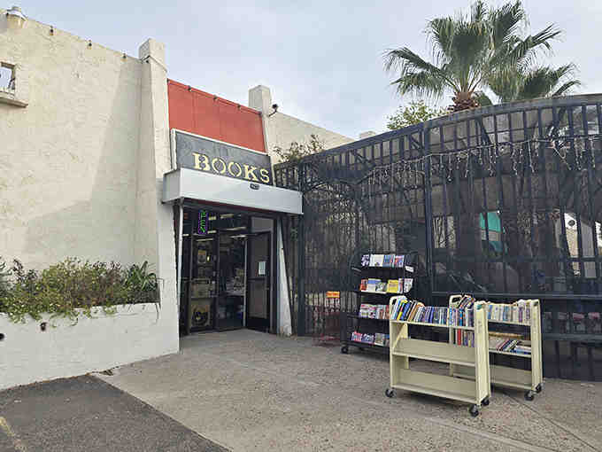 The unassuming exterior of Books on 7th Avenue belies the literary wonderland waiting inside, where thousands of stories seek new homes.
