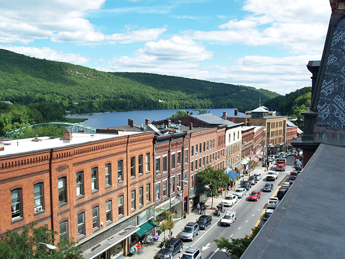 Main Street stretches toward the Connecticut River like Vermont's best-kept secret, where brick buildings and mountain views conspire to make you forget about wherever you came from.