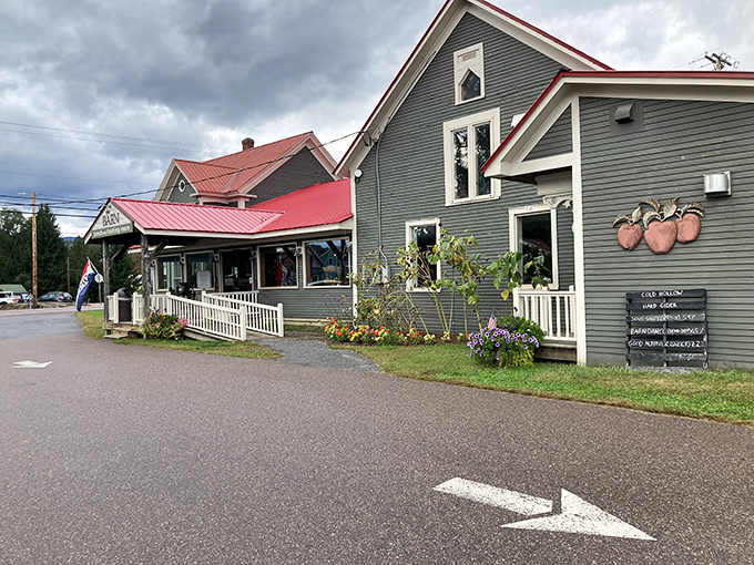 The charming exterior of Cold Hollow Cider Mill stands as Vermont's temple to apple goodness, where cider dreams and donut fantasies come true.