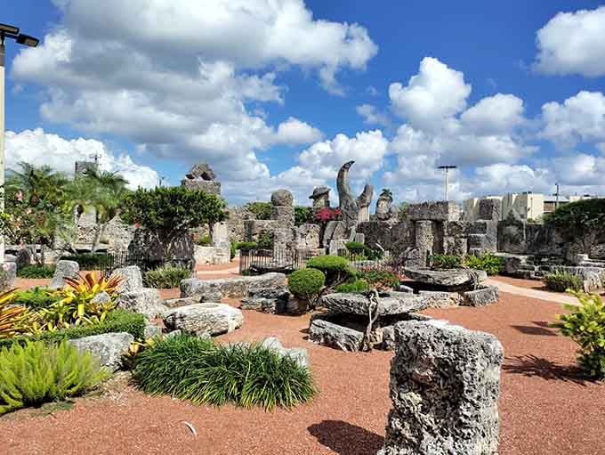 The coral kingdom rises from the Florida landscape like something from another dimension, proving that heartbreak can build monuments that last forever.