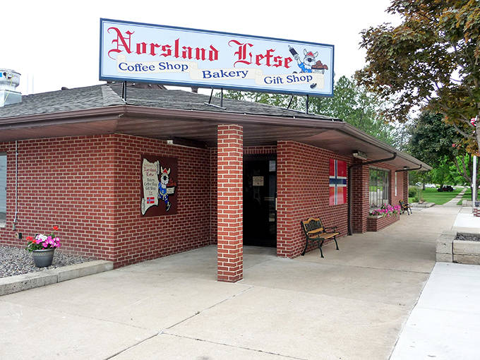 The unassuming brick exterior of Norsland Lefse hides a Norwegian culinary wonderland within. That red and white sign? It's practically a portal to Scandinavia.