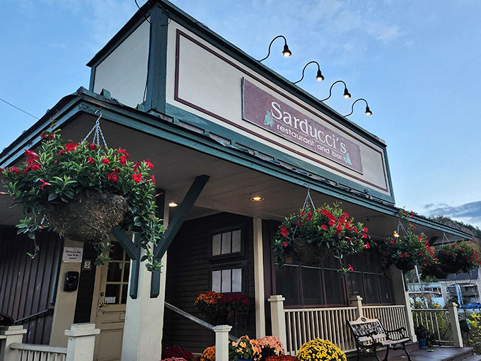 Sarducci's welcoming facade beckons with hanging flower baskets and old-world charm, a little slice of Italy in downtown Montpelier.