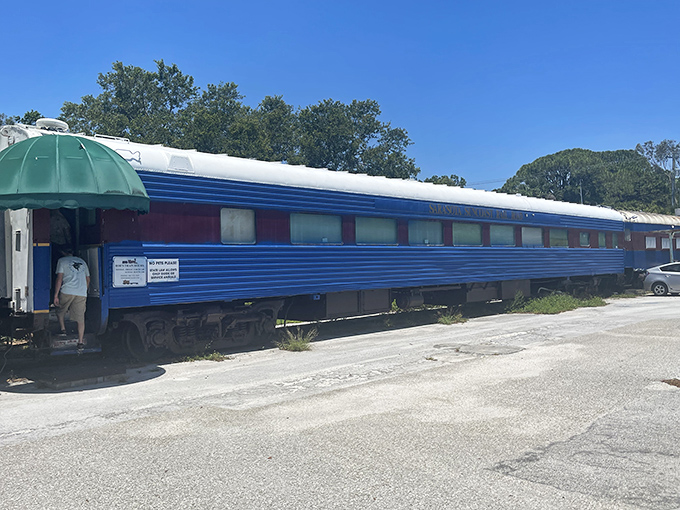The vibrant blue exterior of Bob's Train beckons curious diners like a portal to another era, promising culinary adventures on stationary rails.