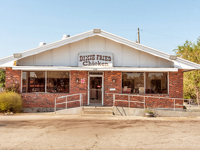 A humble brick fortress of flavor, Dixie Fried Chicken's unassuming exterior hides culinary treasures that locals have cherished for generations.