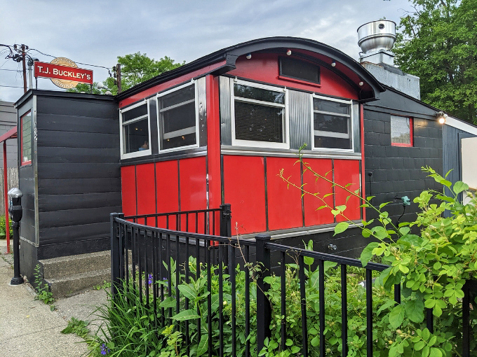 The fire-engine red exterior of T.J. Buckley's stands out like a culinary beacon in Brattleboro, promising a dining adventure inside this vintage 1925 dining car.