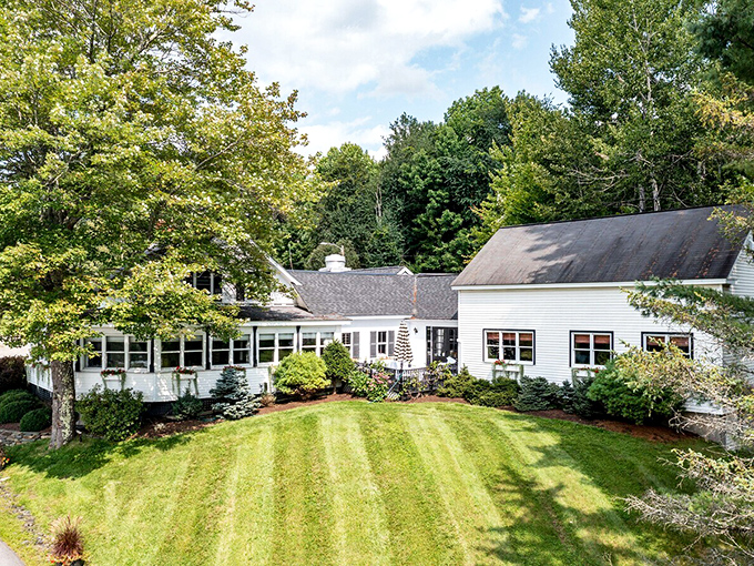 A pristine white farmhouse nestled among Vermont's rolling hills &ndash; Michael's on the Hill stands like a postcard come to life.