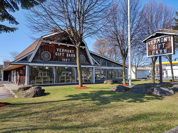 The iconic Vermont Gift Barn exterior stands proudly in Middlebury, its rustic charm beckoning travelers with promises of authentic treasures within.
