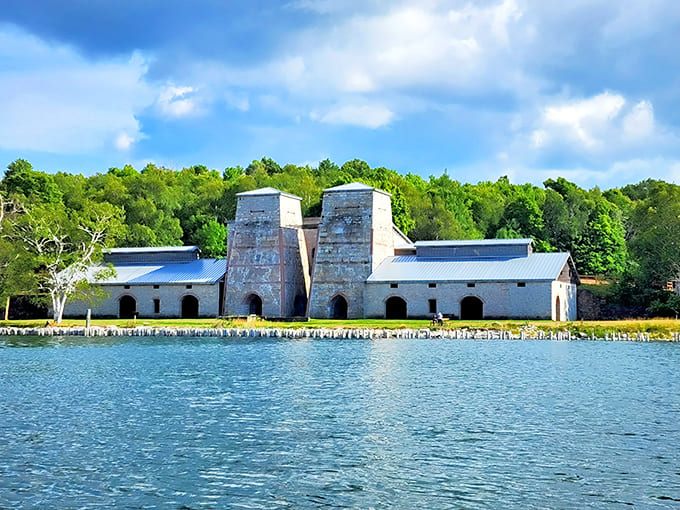 Those limestone towers rising from the harbor look like a castle guarding secrets of Michigan's industrial past, and honestly, they kind of are.