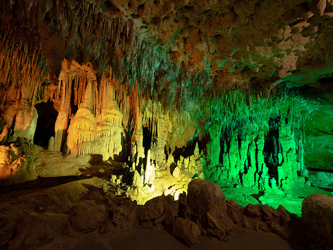 Nature's light show illuminates these ancient stalactites, creating a cathedral-like atmosphere that makes you whisper automatically.