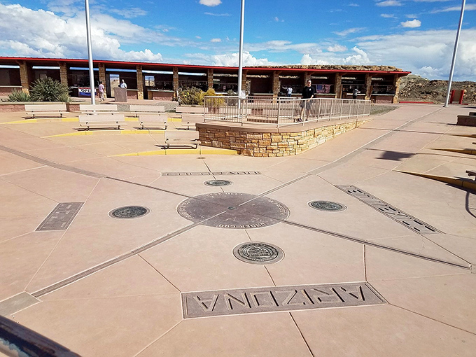 The iconic Four Corners Monument plaza, where four states meet in one extraordinary spot under the vast southwestern sky.