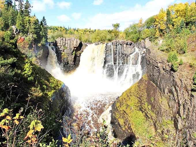 Nature's ultimate power move: High Falls crashes down 120 feet of ancient rock, creating Minnesota's tallest and most dramatic waterfall spectacle.
