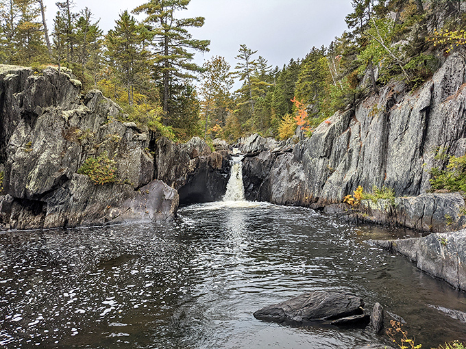 The gateway to adventure: Gulf Hagas trailhead welcomes hikers with promises of natural wonders just beyond the treeline.
