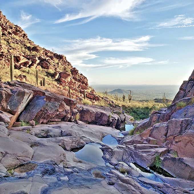 Nature's infinity pool: Desert rocks cradle crystal-clear water, reflecting the azure Arizona sky like a mirror to heaven.