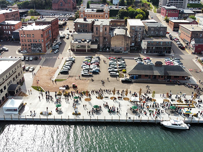 Downtown Houghton embraces its waterfront identity with a vibrant mix of historic buildings and modern amenities along Portage Lake.