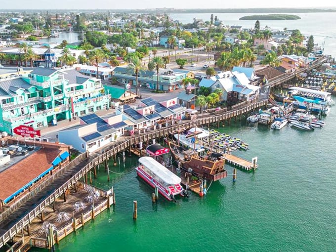 John's Pass: Where turquoise waters meet weathered boardwalks, creating a postcard-perfect Florida scene that feels like vacation incarnate.