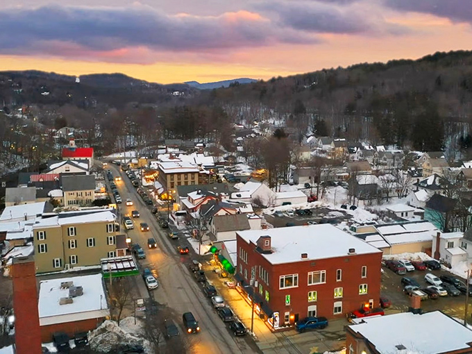 Ludlow's twilight skyline paints a perfect Vermont postcard &ndash; small-town charm with big mountain backdrop.