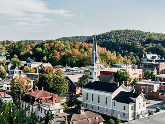 Montpelier's colorful autumn canopy embraces church spires and historic buildings &ndash; New England charm personified in Vermont's capital.
