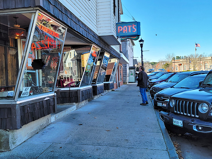 The iconic storefront beckons with its vintage charm – a Maine landmark where pizza dreams come true.