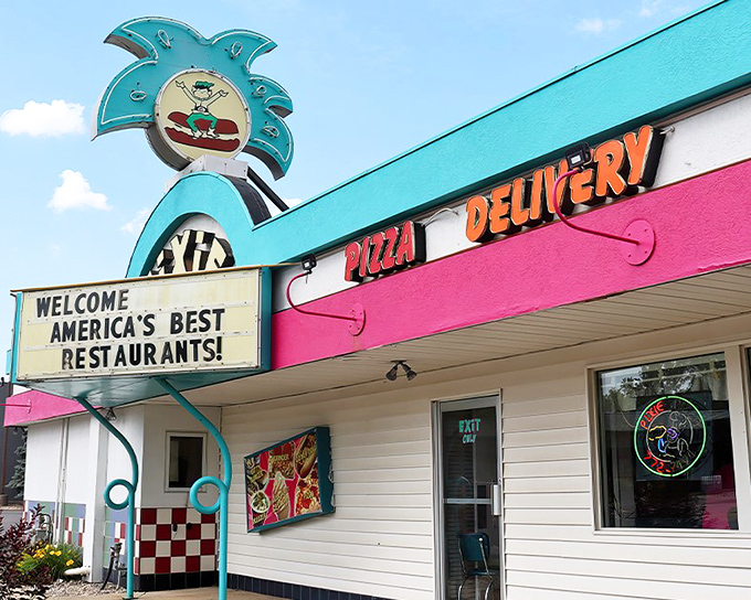 Where turquoise dreams and neon promises beckon hungry travelers with a splash of mid-century magic that's impossible to resist.