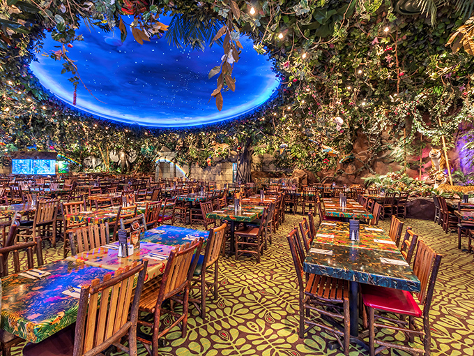 Step into another world at Rainforest Cafe Detroit, where dining beneath a starry blue dome surrounded by lush foliage transforms dinner into an expedition.