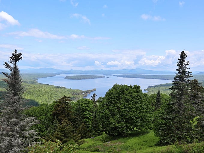 Expansive lake views and lush mountains line Rangeley Lakes National Scenic Byway, giving travelers a glimpse of Maine&rsquo;s natural beauty.