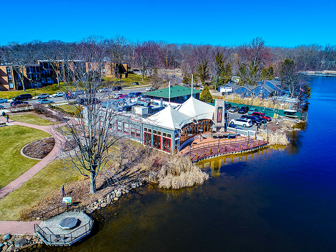 A culinary lighthouse perched on Reeds Lake, where the distinctive white tent-top roof signals delicious adventures await below.