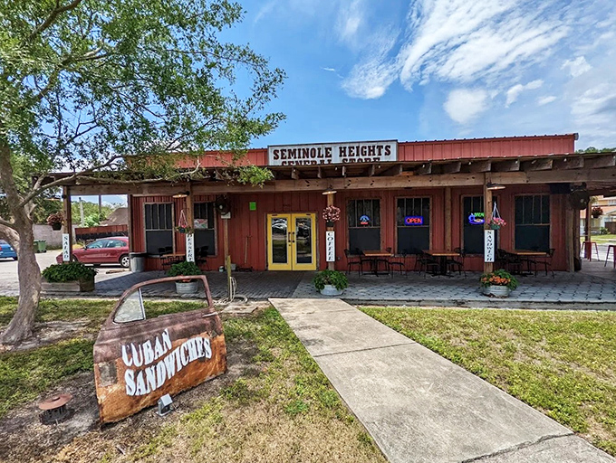 That rustic red exterior and welcoming porch make you feel like you're visiting a friend's place, not just grabbing lunch in Tampa.