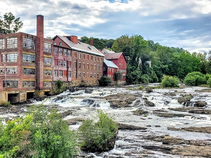 Where waterfalls meet history, Springfield's mill buildings stand like proud sentinels along the Black River's edge.