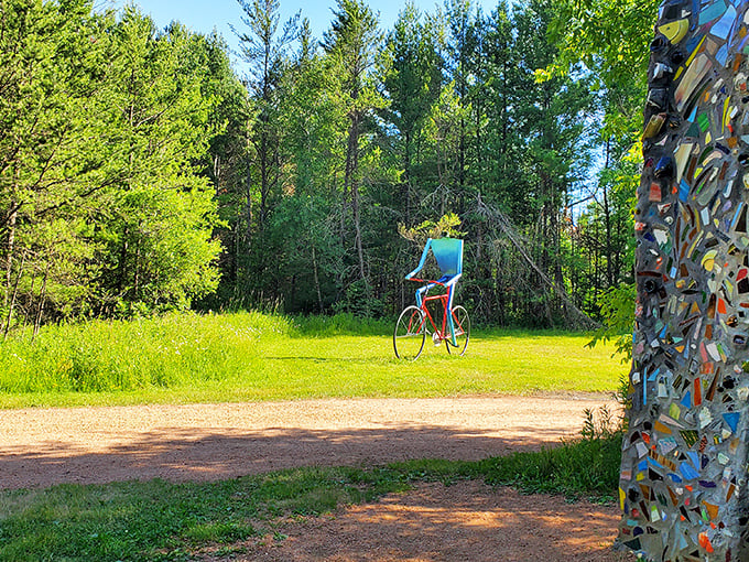 A blue cyclist frozen in eternal motion, this whimsical figure reminds us that sometimes the journey matters more than the destination.