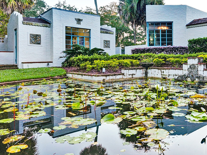 The Maitland Art Center's pristine white fa&ccedil;ade creates a stunning backdrop for lily pads performing their silent water ballet.