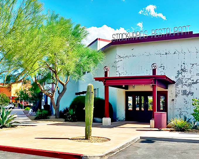 The Stockyards exterior welcomes diners with Southwestern charm and that solitary saguaro standing guard like a spiky ma&icirc;tre d'.