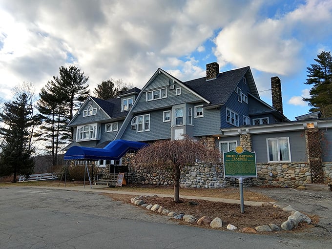 The stately Hartness House Inn stands proudly in Springfield, Vermont, its stone foundation hinting at secrets below.