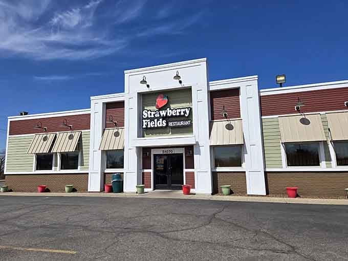 That cheerful strawberry logo beckons hungry Beatles fans to a breakfast experience that's anything but ordinary in Chesterfield Township.