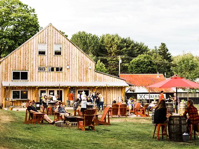 Rustic charm meets outdoor bliss at Oxbow Beer Garden, where the weathered barn beckons visitors to slow down and savor life's simple pleasures.