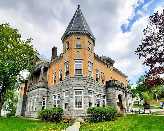 Behold the grand dame of border-crossing literature! This yellow brick beauty with its stone foundation and turret looks like Hogwarts' charming New England cousin.
