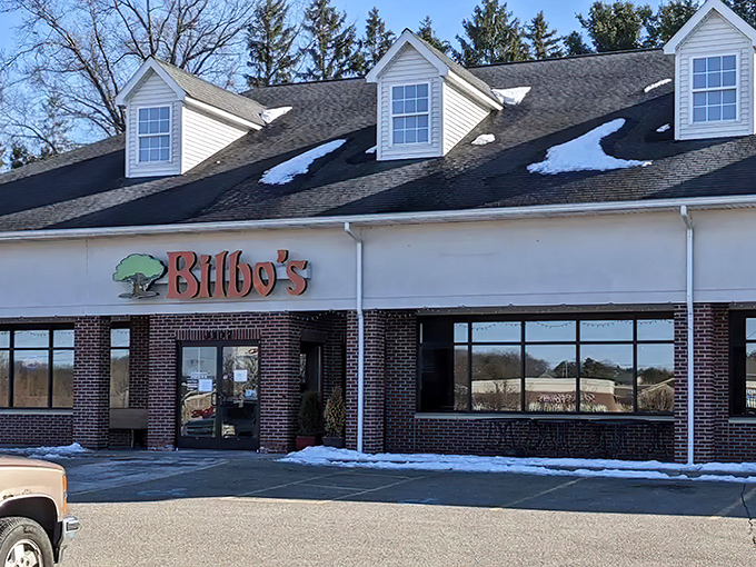 Bilbo's welcoming exterior stands ready for adventure-seekers, its charming brick facade and distinctive sign promising magical flavors within.