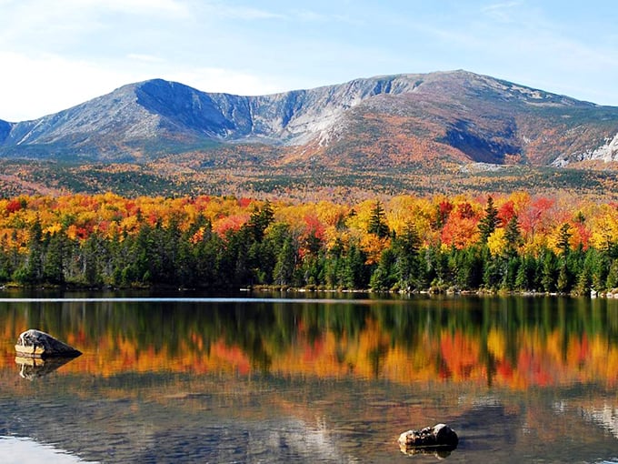 Baxter State Park stretches before you like nature's own cathedral, where mountains meet sky in perfect harmony.