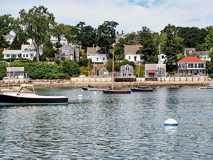Castine's waterfront homes stand like elegant sentinels, their weathered shingles and white trim telling stories of maritime glory days gone by.