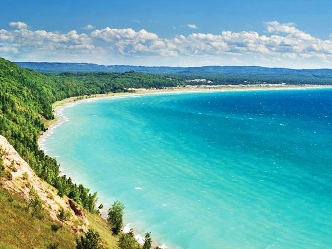 Nature's perfect pathway leads adventurers through Sleeping Bear's hidden gem, where every step brings you closer to breathtaking views.