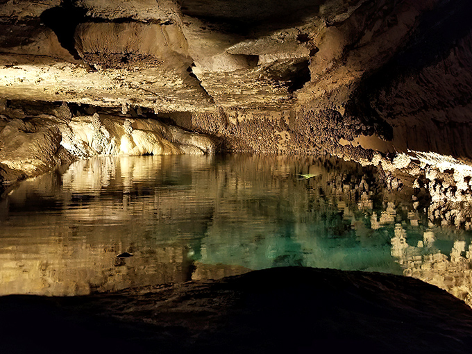 The turquoise waters of Mystery Cave reflect millions of years of geological artistry beneath Minnesota's rolling landscape.