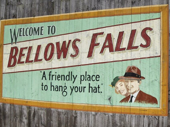 The vintage "Welcome to Bellows Falls" sign greets visitors with small-town charm and a promise of friendly hospitality ahead.