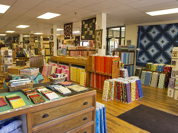 Yankee Pride Quilts: Where fabric dreams come true! This quilter's paradise offers thousands of bolts arranged in a rainbow of possibilities that would make even non-crafters swoon.