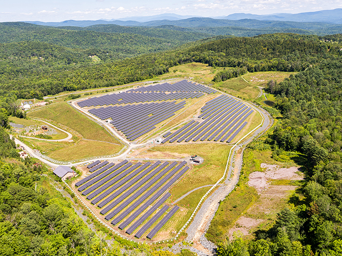 From above, the Elizabeth Mine looks like someone spilled a giant's watercolor set across the Vermont hills, with solar panels adding a surprisingly harmonious modern touch to this reclaimed landscape.