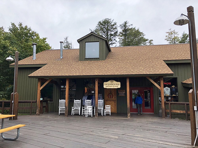 The rustic charm of Tahquamenon Falls Brewery & Pub welcomes visitors with its wooden beams and inviting porch &ndash; wilderness comfort at its finest.
