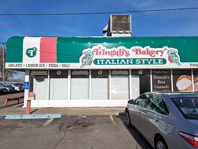 The iconic green, white, and red awning of Tringali's Bakery stands as a beacon of Italian sweetness in Warren, Michigan.