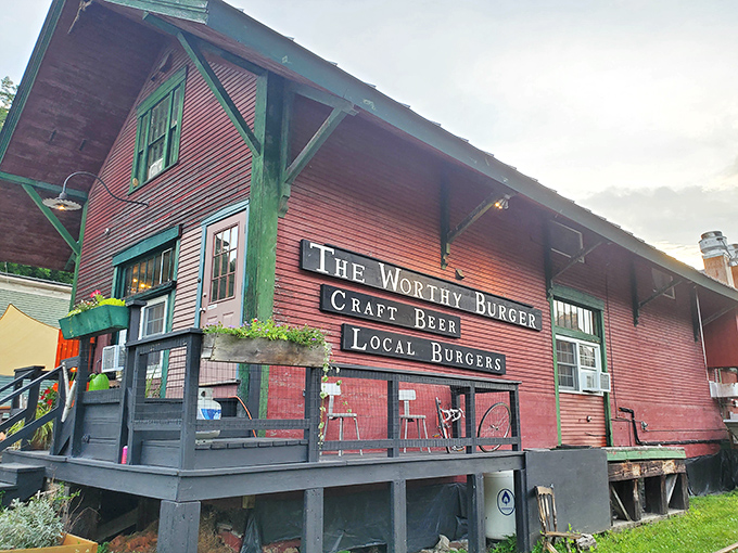 The iconic red barn exterior of The Worthy Burger stands proudly in South Royalton, promising craft beer and local burgers that'll make your taste buds dance.