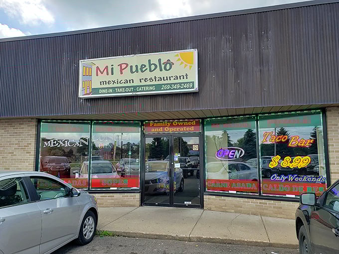 That cheerful sunshine logo on the sign knows something you're about to discover: happiness lives inside this unassuming strip mall location.